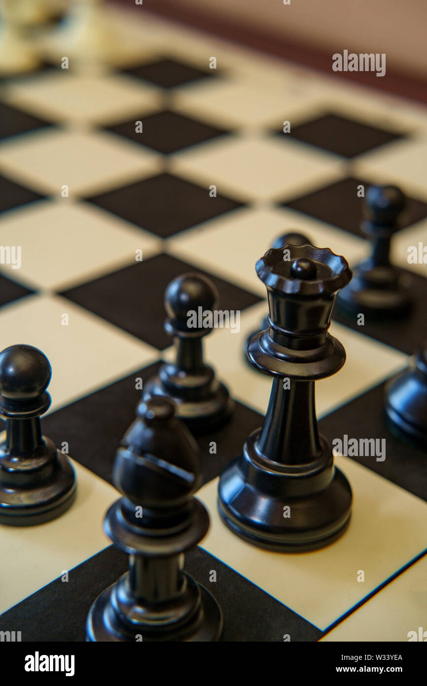 Chess pieces and board set up for beginning of game Stock Photo - Alamy