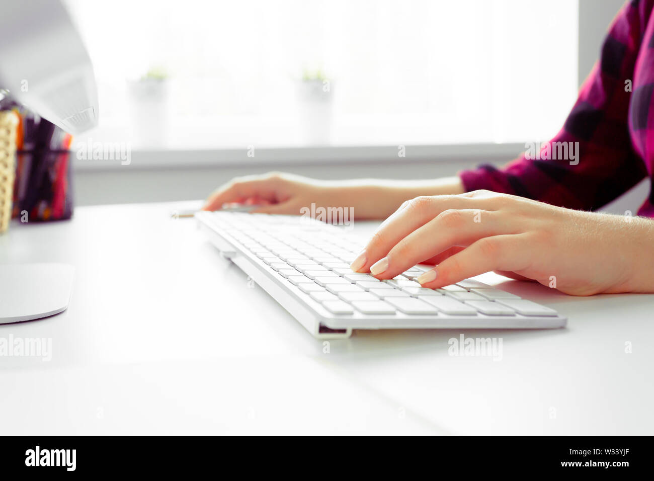 Hands of an office woman typing Stock Photo - Alamy