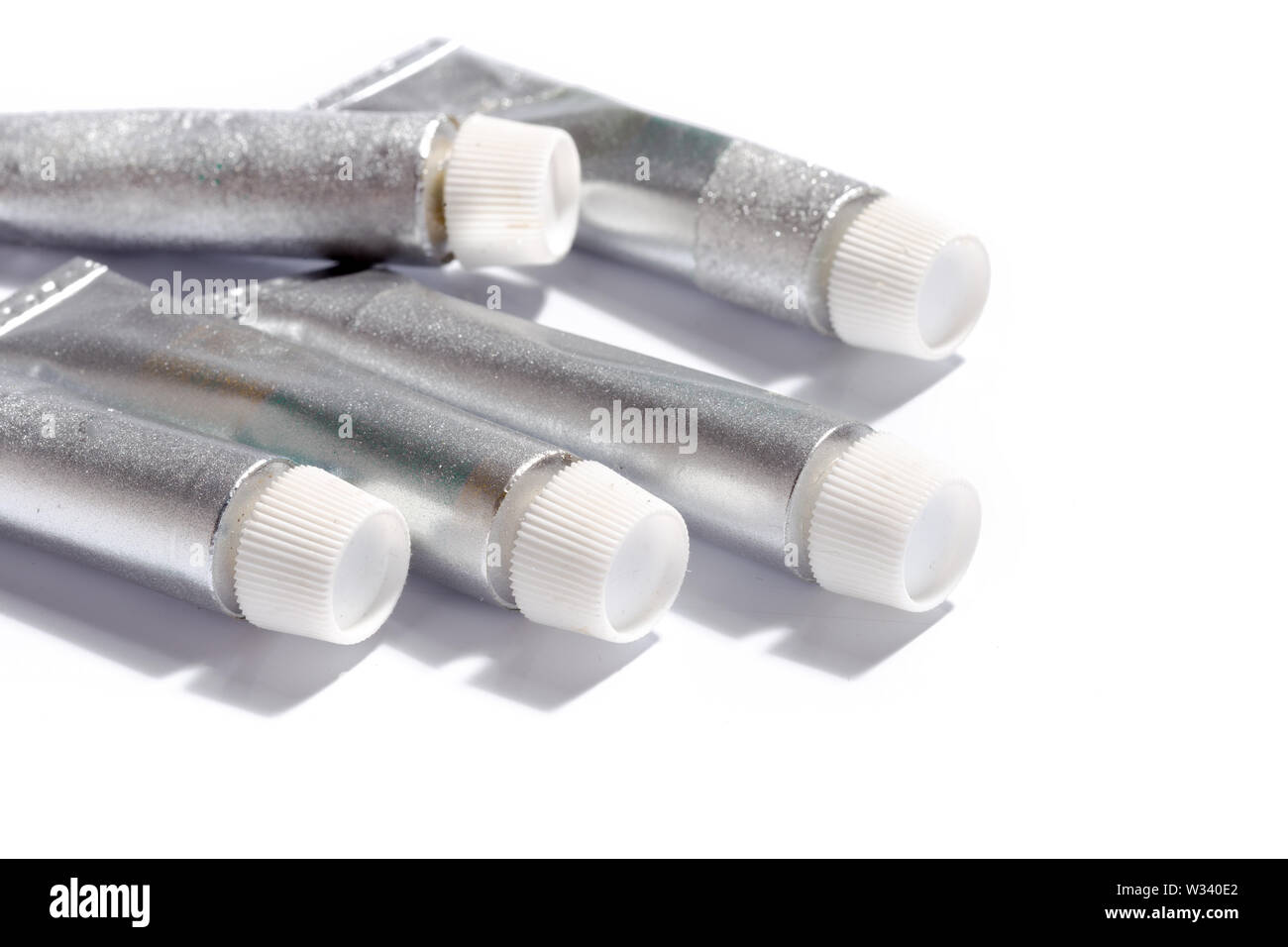 paint in tubes isolated on white Stock Photo - Alamy
