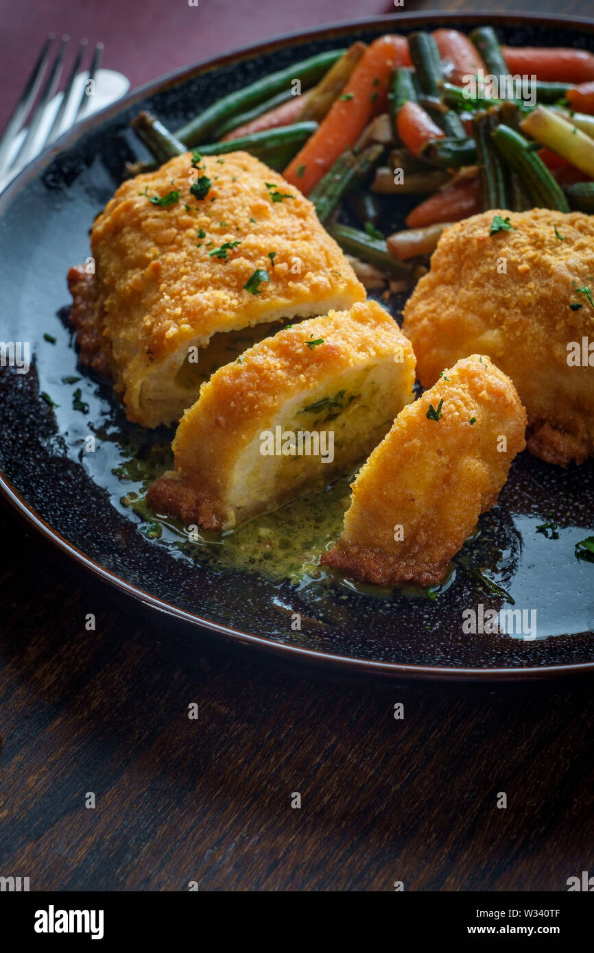 Russian cuisine stuffed chicken cutlets kiev-style with butter sauce ...