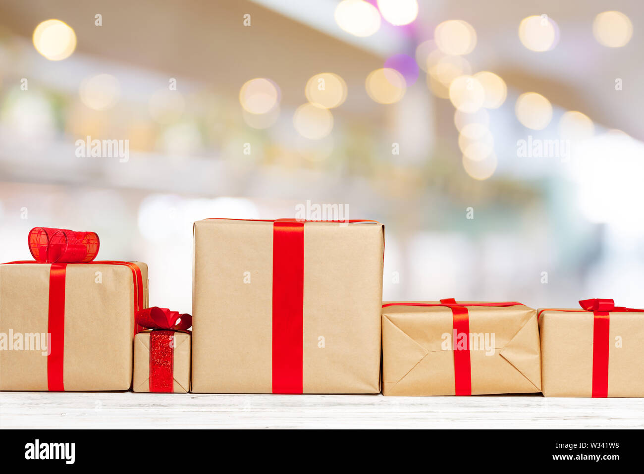 pile of gifts on the old table Stock Photo - Alamy