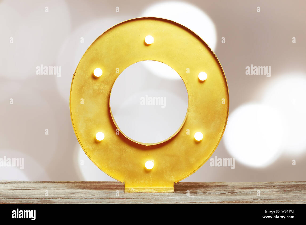 Big plastic numbers with shining light bulbs Stock Photo - Alamy