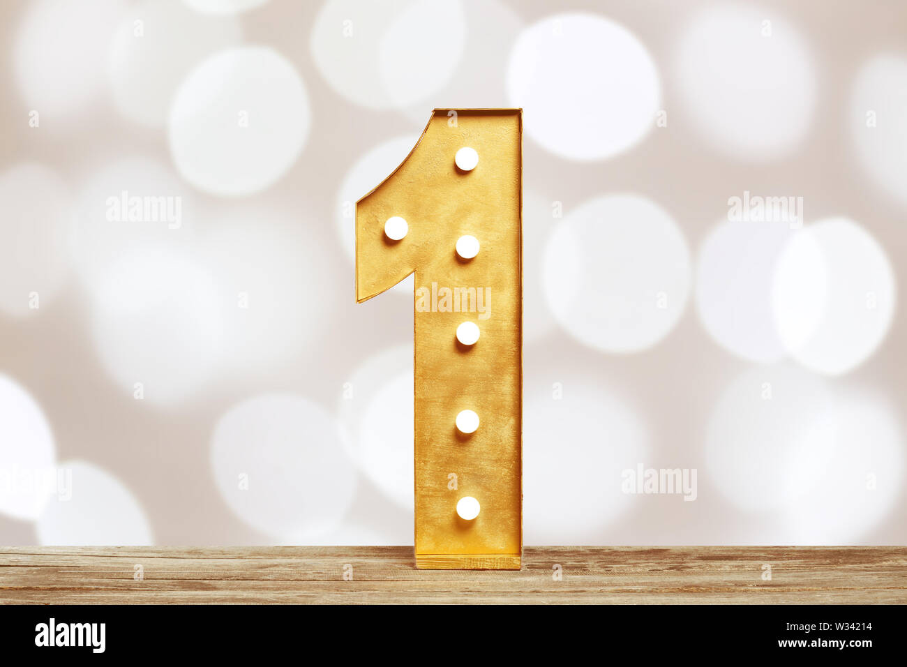 Big plastic numbers with shining light bulbs Stock Photo - Alamy