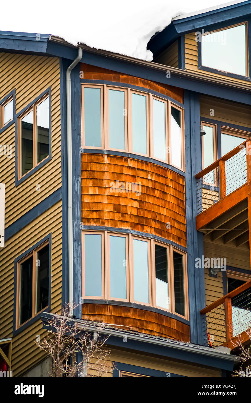 Close up of residential building exterior with horizontal siding and ...