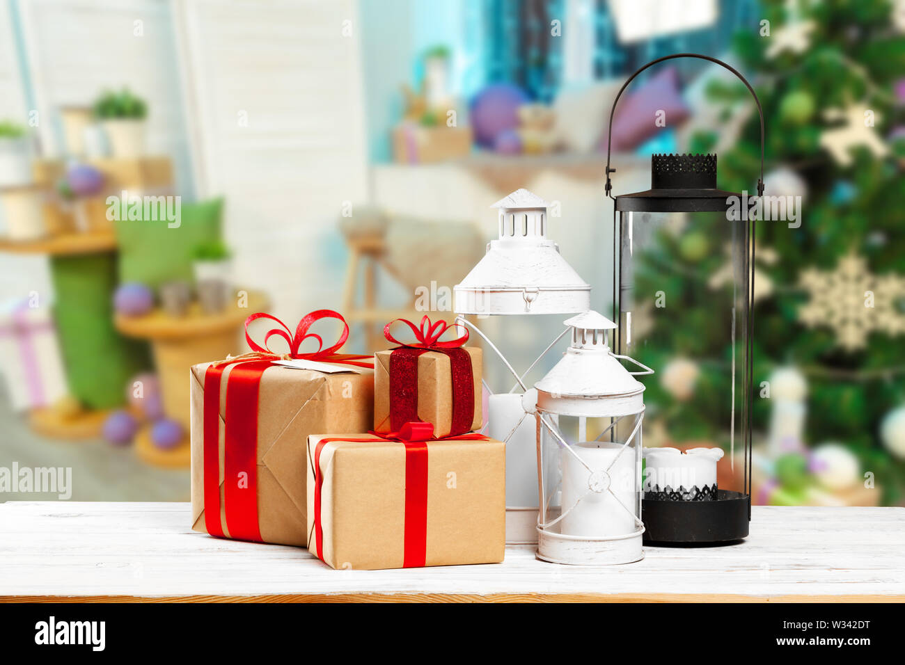 pile of gifts on the old table Stock Photo - Alamy