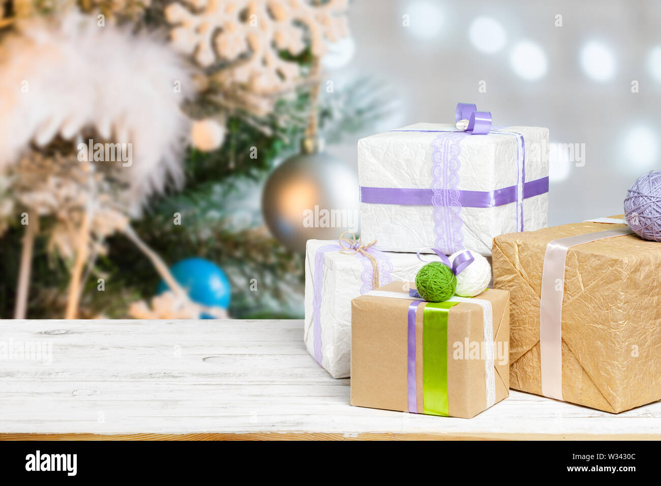 pile of gifts on the old table Stock Photo - Alamy