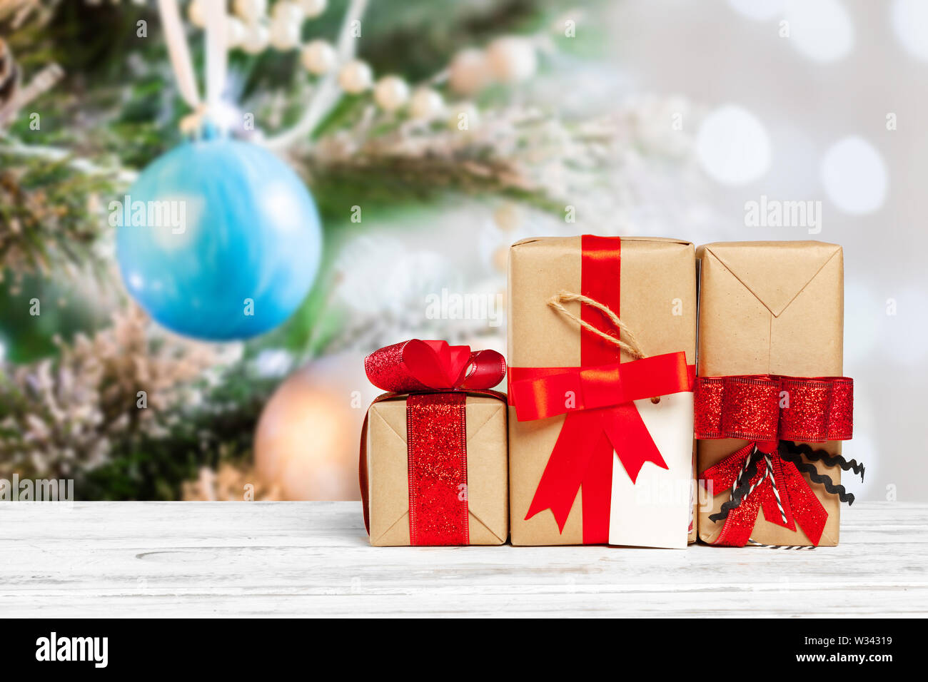 pile of gifts on the old table Stock Photo - Alamy