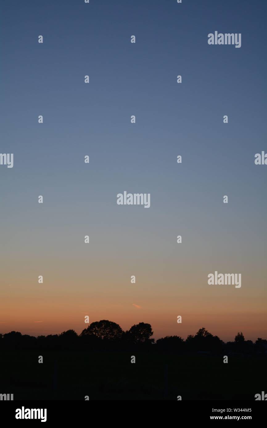 Suble sheds of colour in the sunset sky Stock Photo - Alamy