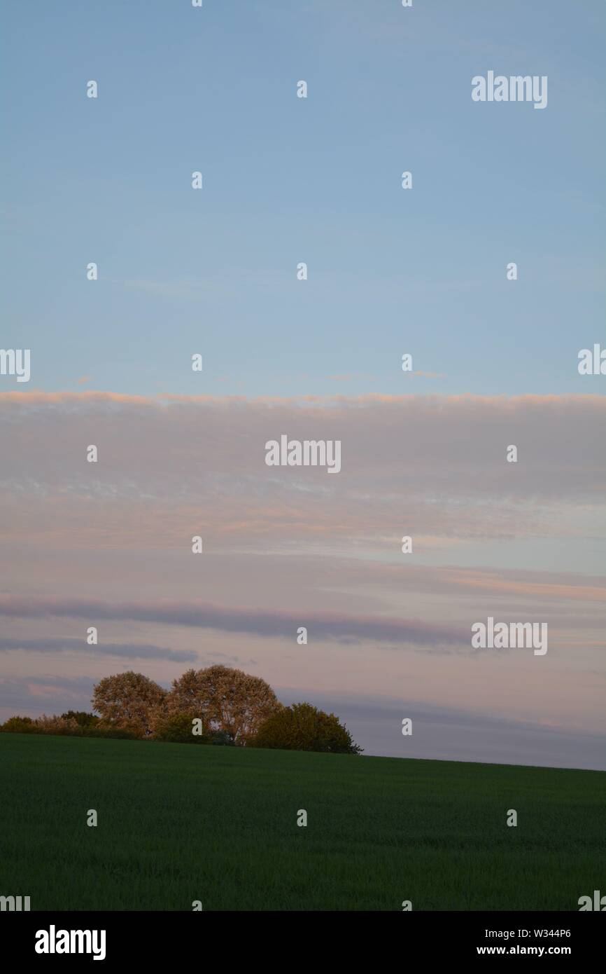 Suble sheds of colour in the sunset sky Stock Photo - Alamy