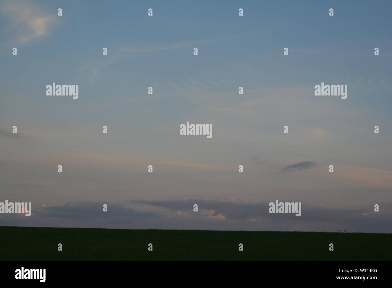 Suble sheds of colour in the sunset sky Stock Photo - Alamy