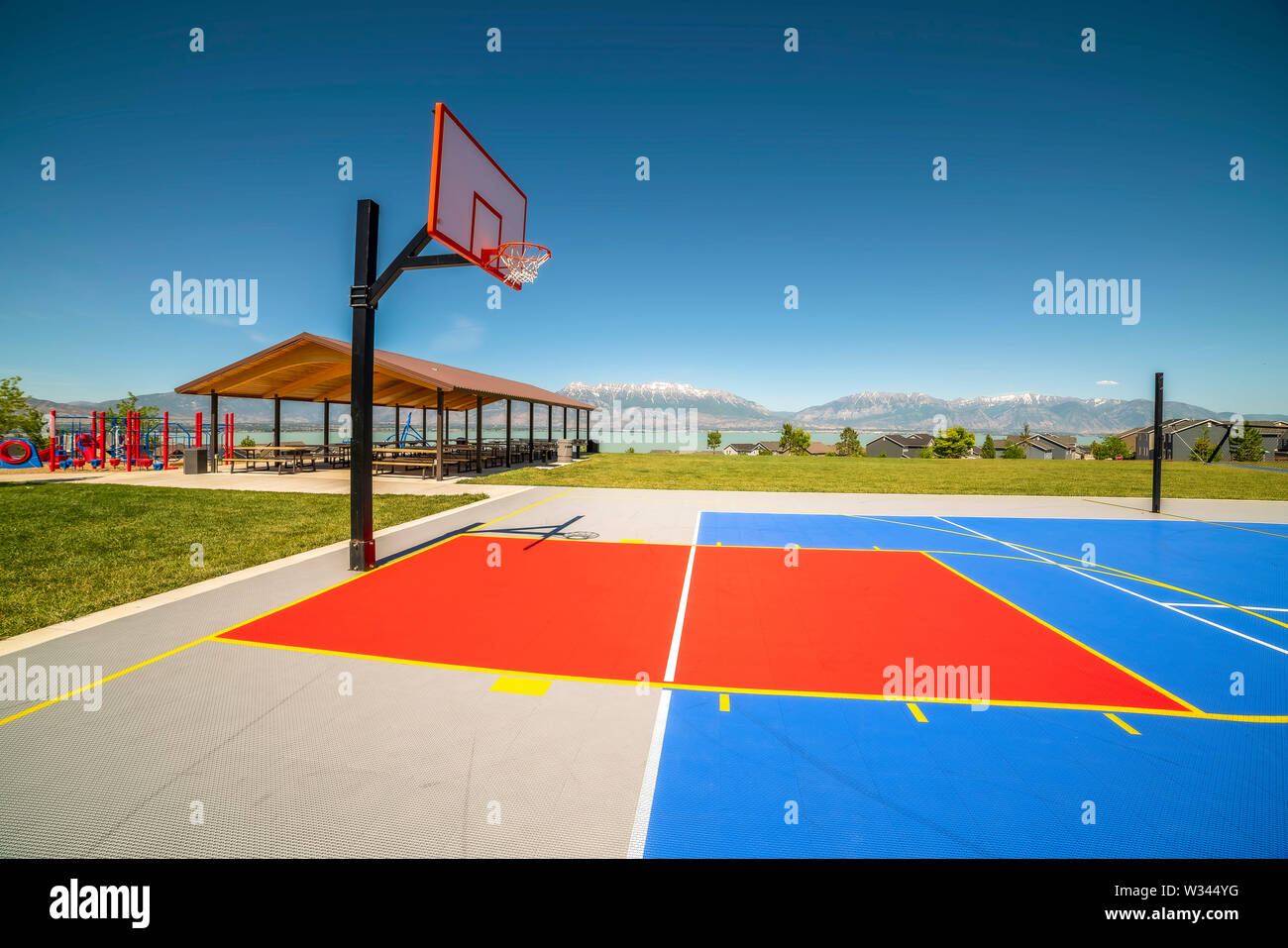 Park basketball court with childrens playground and picnic pavilion for ...