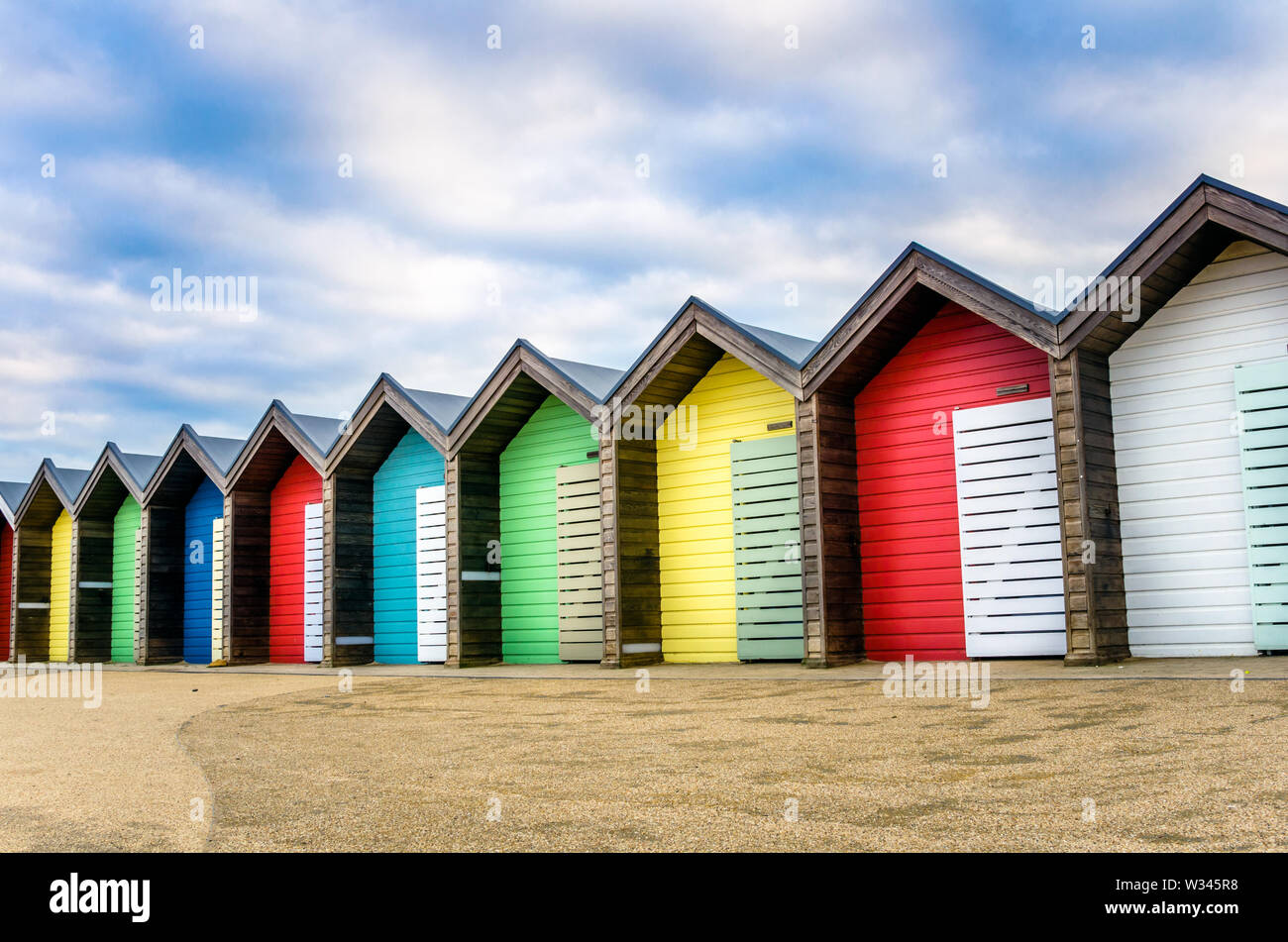 Beautiful coloured beach huts hi-res stock photography and images - Alamy
