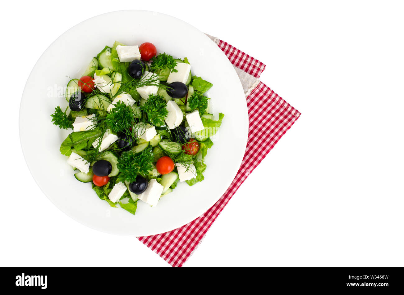 Salad green olives feta tomato Cut Out Stock Images & Pictures - Alamy
