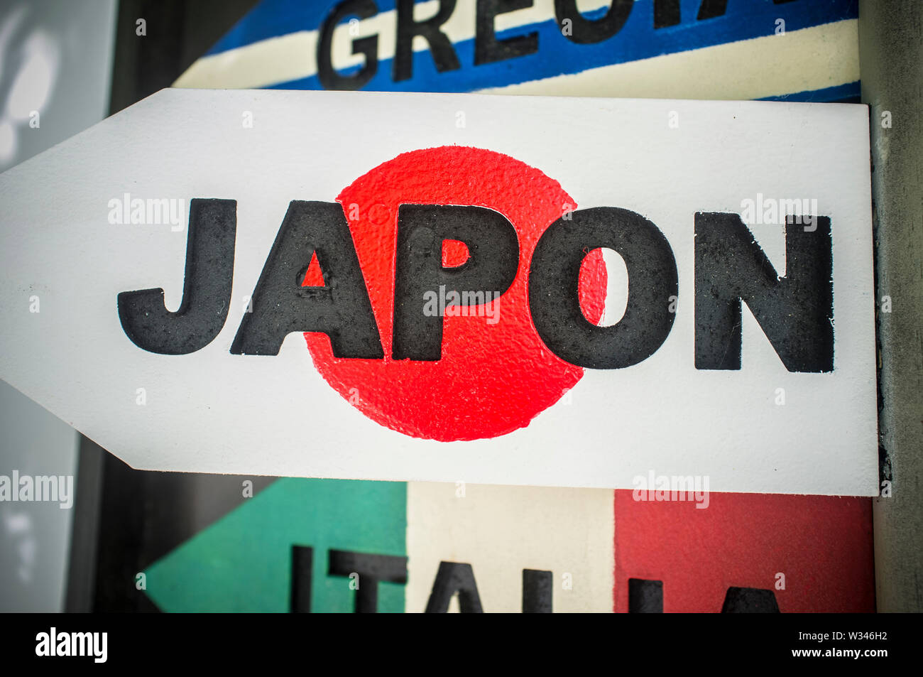 Pole guidepost with Japan sign and flag as background. Travel concept ...