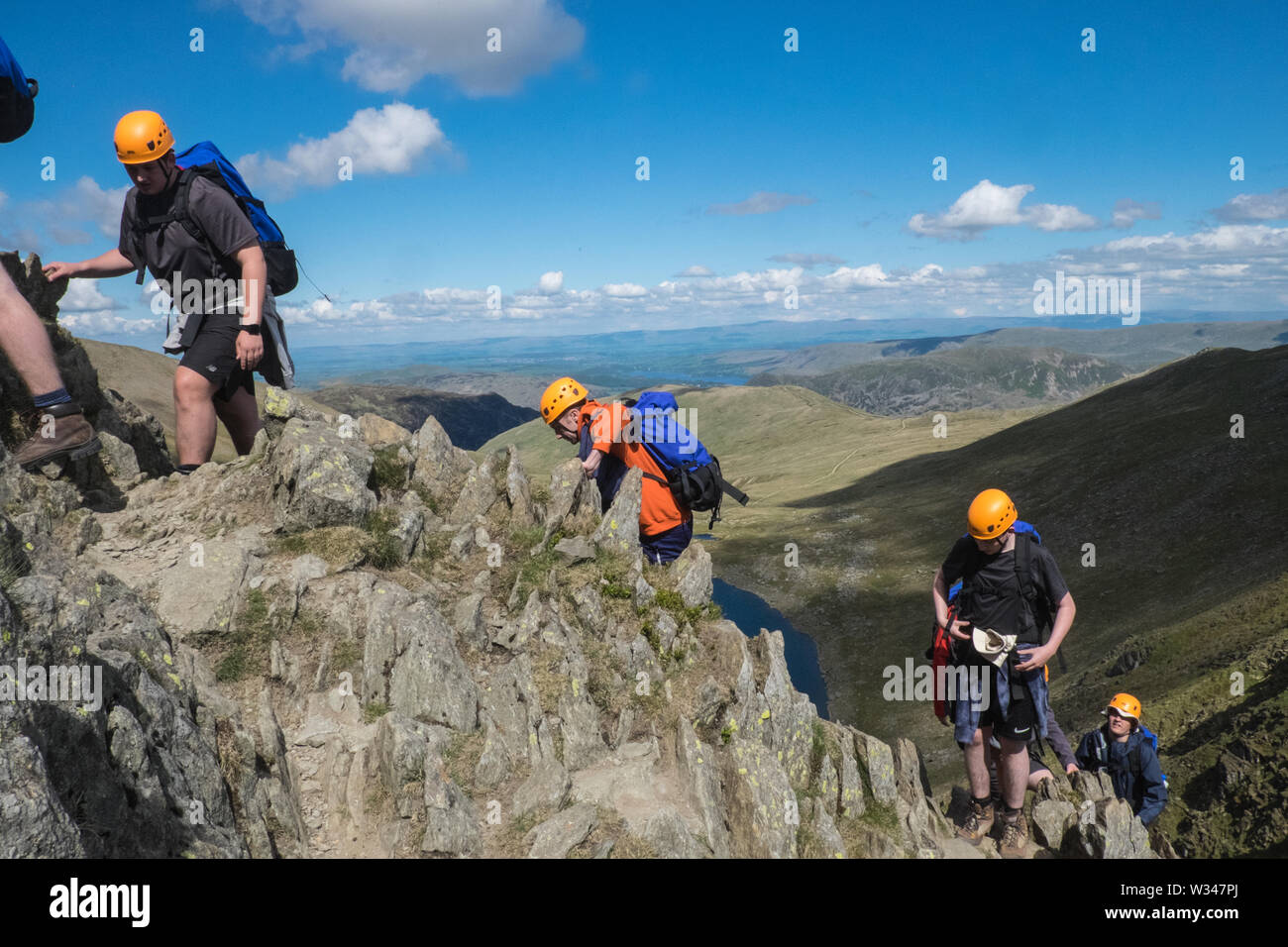 Helvellyn striding edge hiker hi-res stock photography and images - Alamy