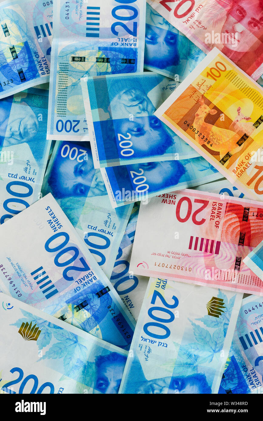 Stack of various Israeli shekel bills. Israel money banknotes of 50, 20 ...