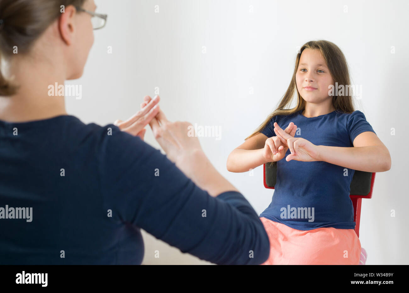 Kid sign language hi-res stock photography and images - Alamy