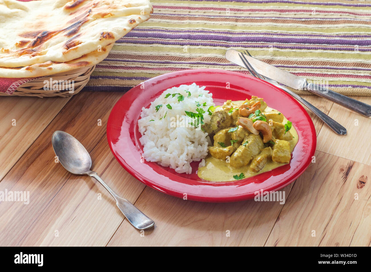 Authentic Indian chicken korma curry with jasmine rice Stock Photo - Alamy