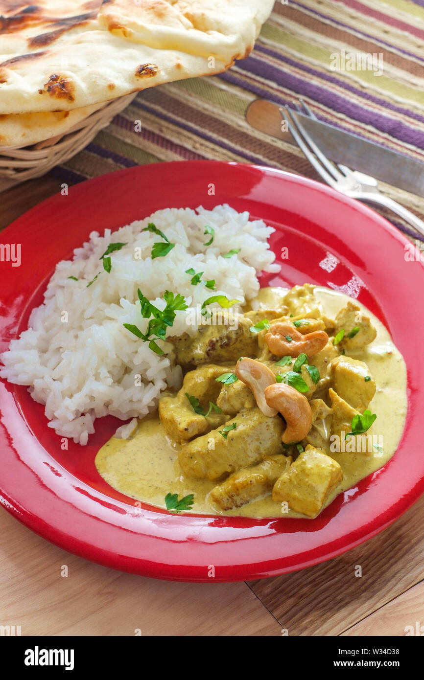 Authentic Indian chicken korma curry with jasmine rice Stock Photo - Alamy