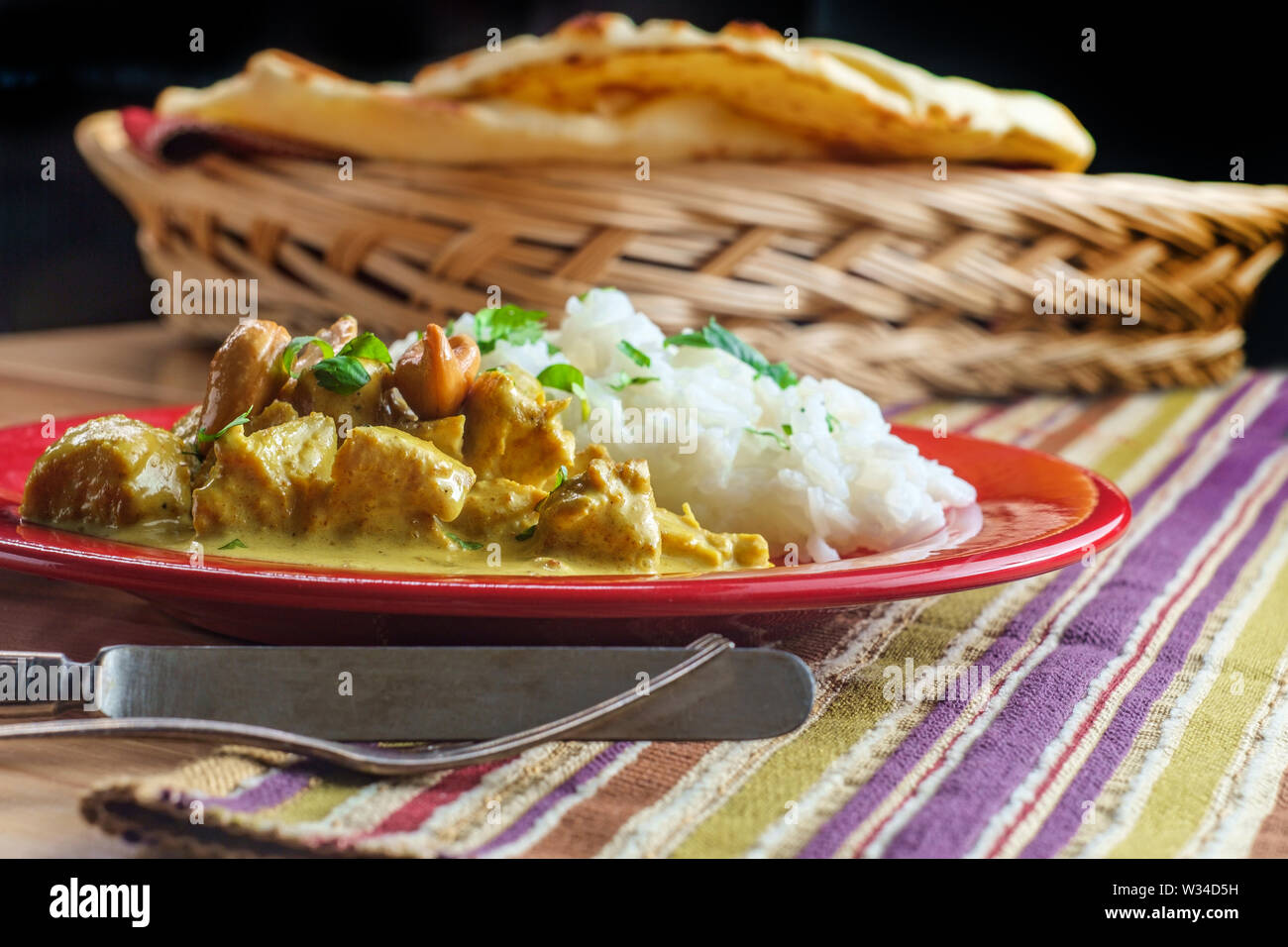 Authentic Indian chicken korma curry with jasmine rice Stock Photo - Alamy