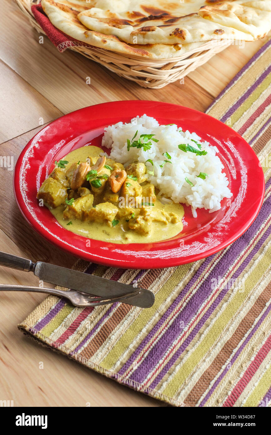 Authentic Indian chicken korma curry with jasmine rice Stock Photo - Alamy