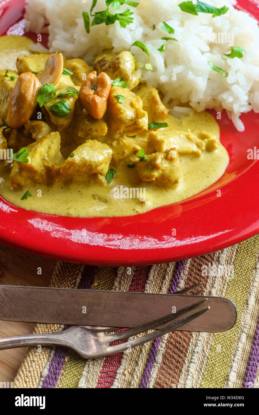 Authentic Indian chicken korma curry with jasmine rice Stock Photo - Alamy