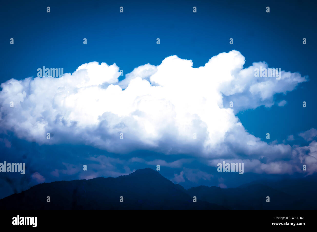 Background photo of Cloudy overcast morning at himalayan mountains ...