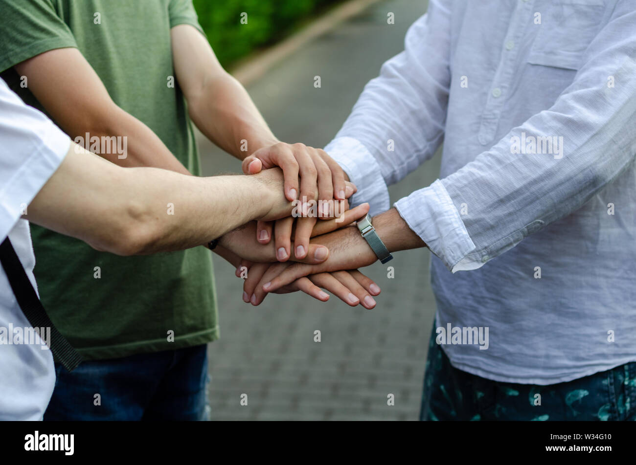 Teamwork with join hands and standing together for cooperation success ...