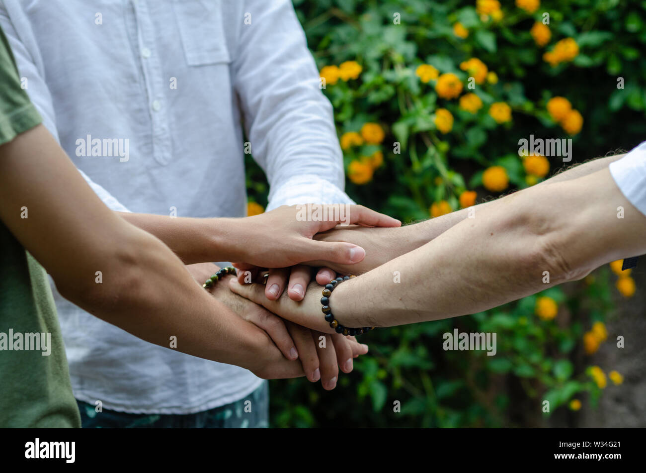 Teamwork with join hands and standing together for cooperation success ...