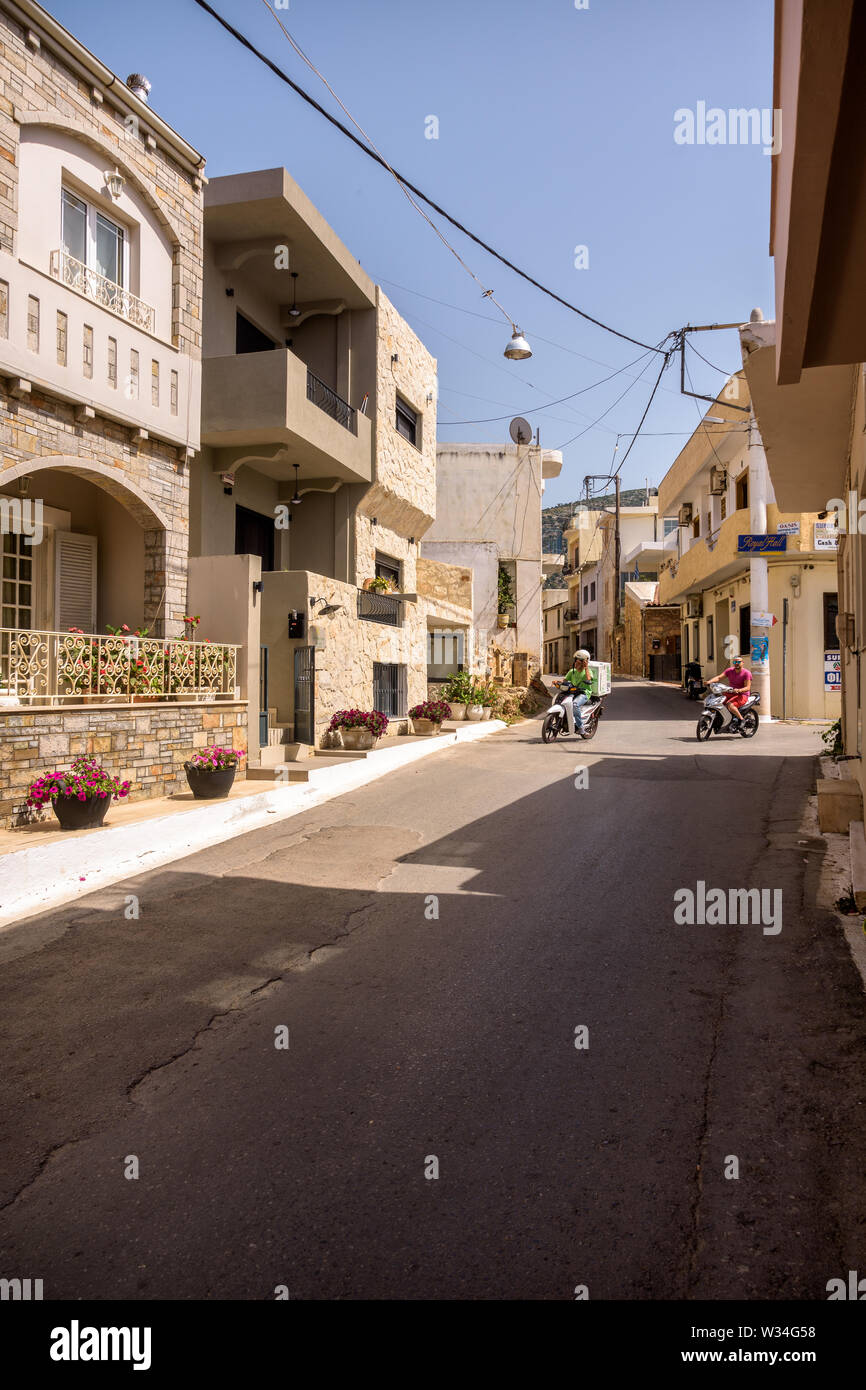 Malia, Crete, Greece - May 27, 2019. Daytime view of the streets in ...