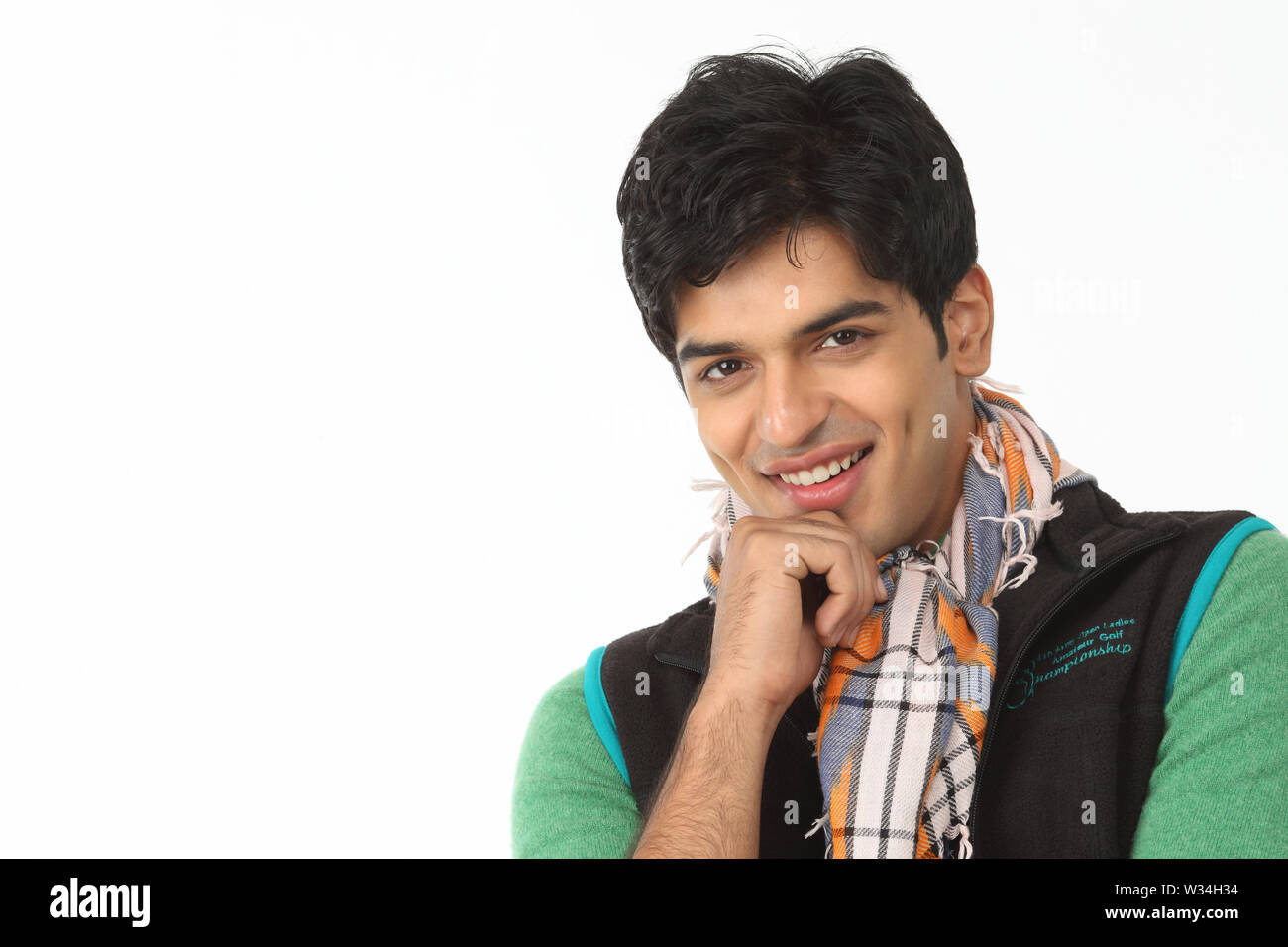 Portrait of an Indian young man smiling Stock Photo - Alamy