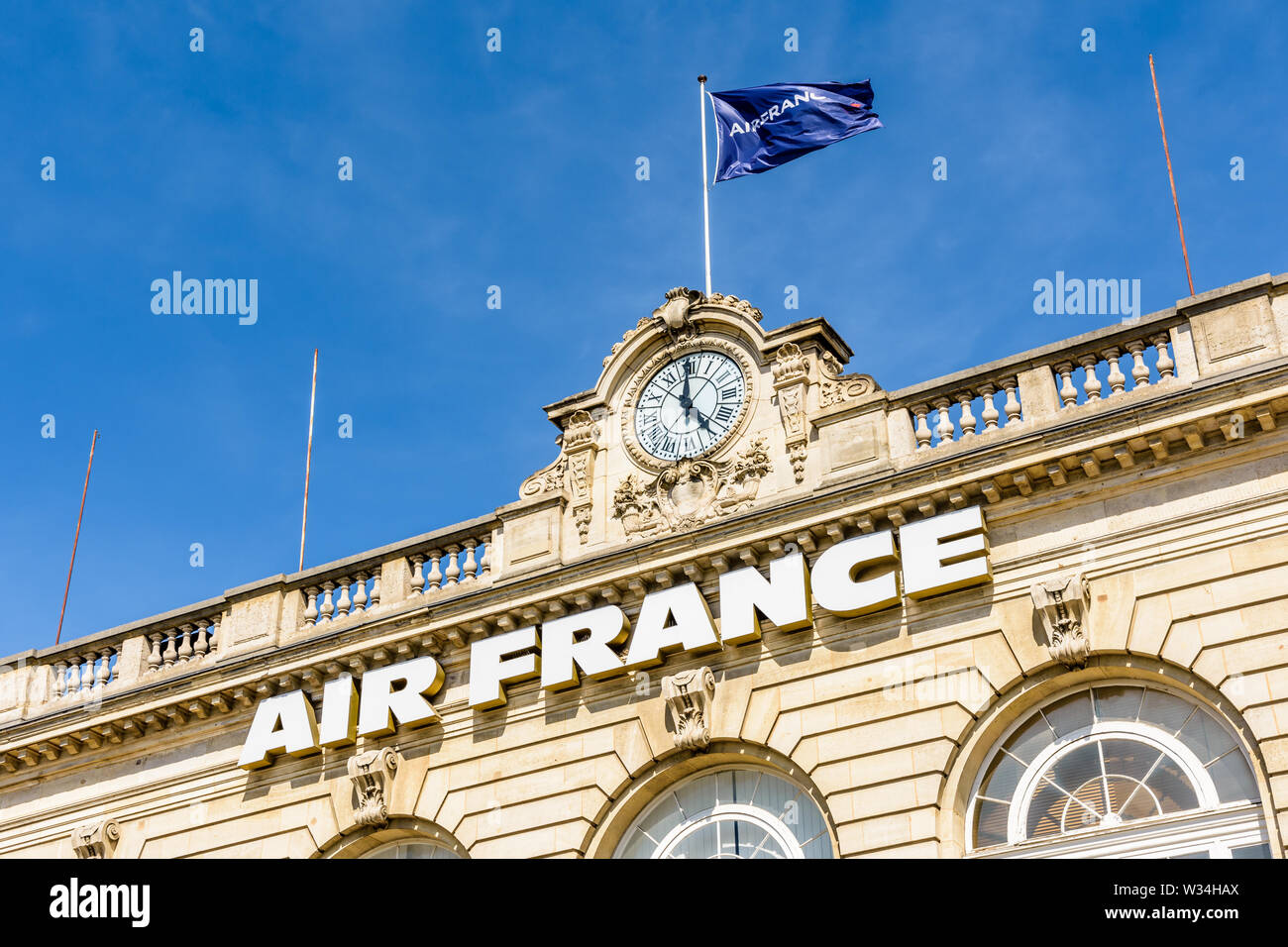 The Air France sign is affixed to the facade of the Invalides air ...