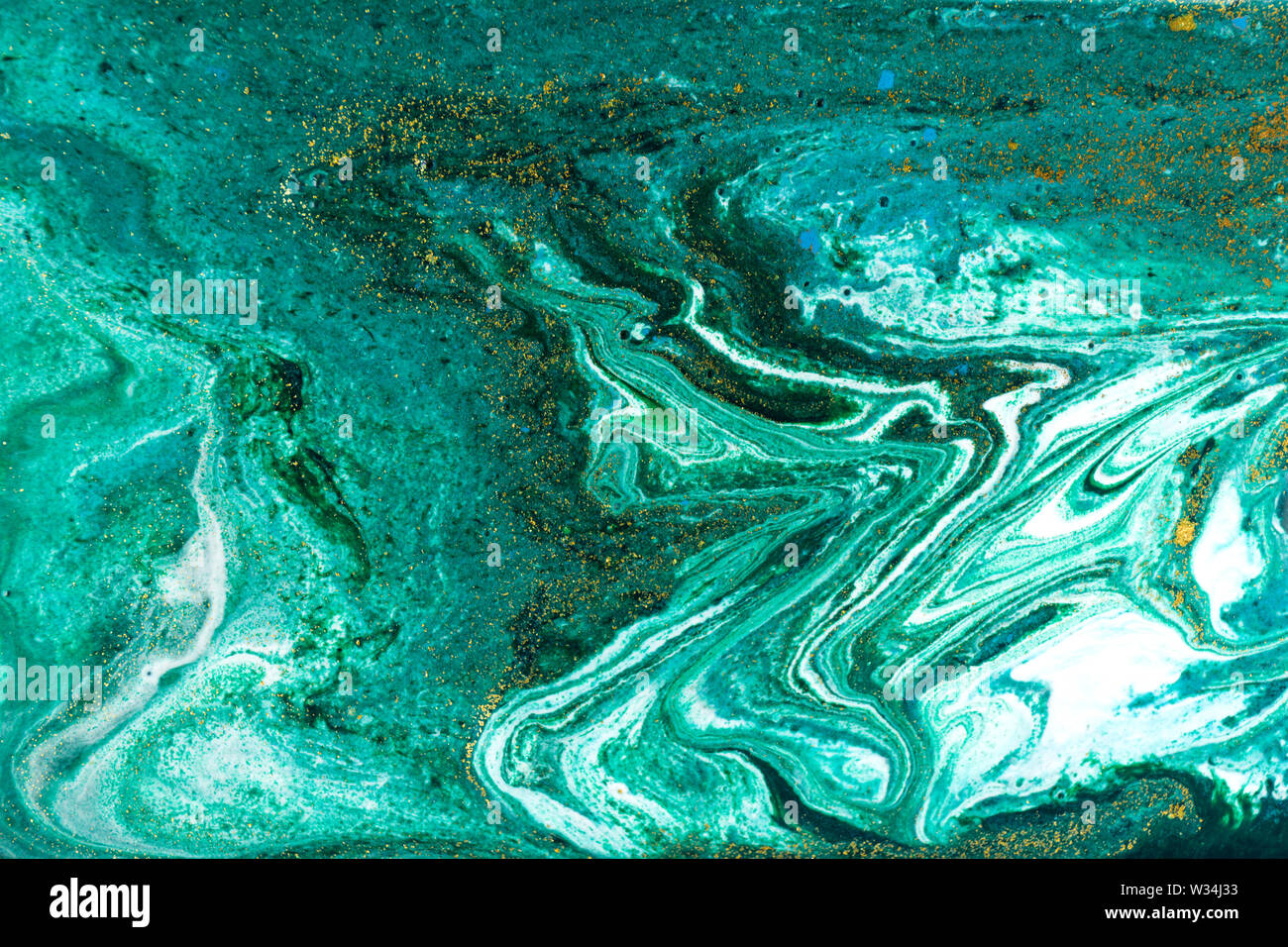 Liquid uneven green marbling pattern with glare of light Stock Photo ...