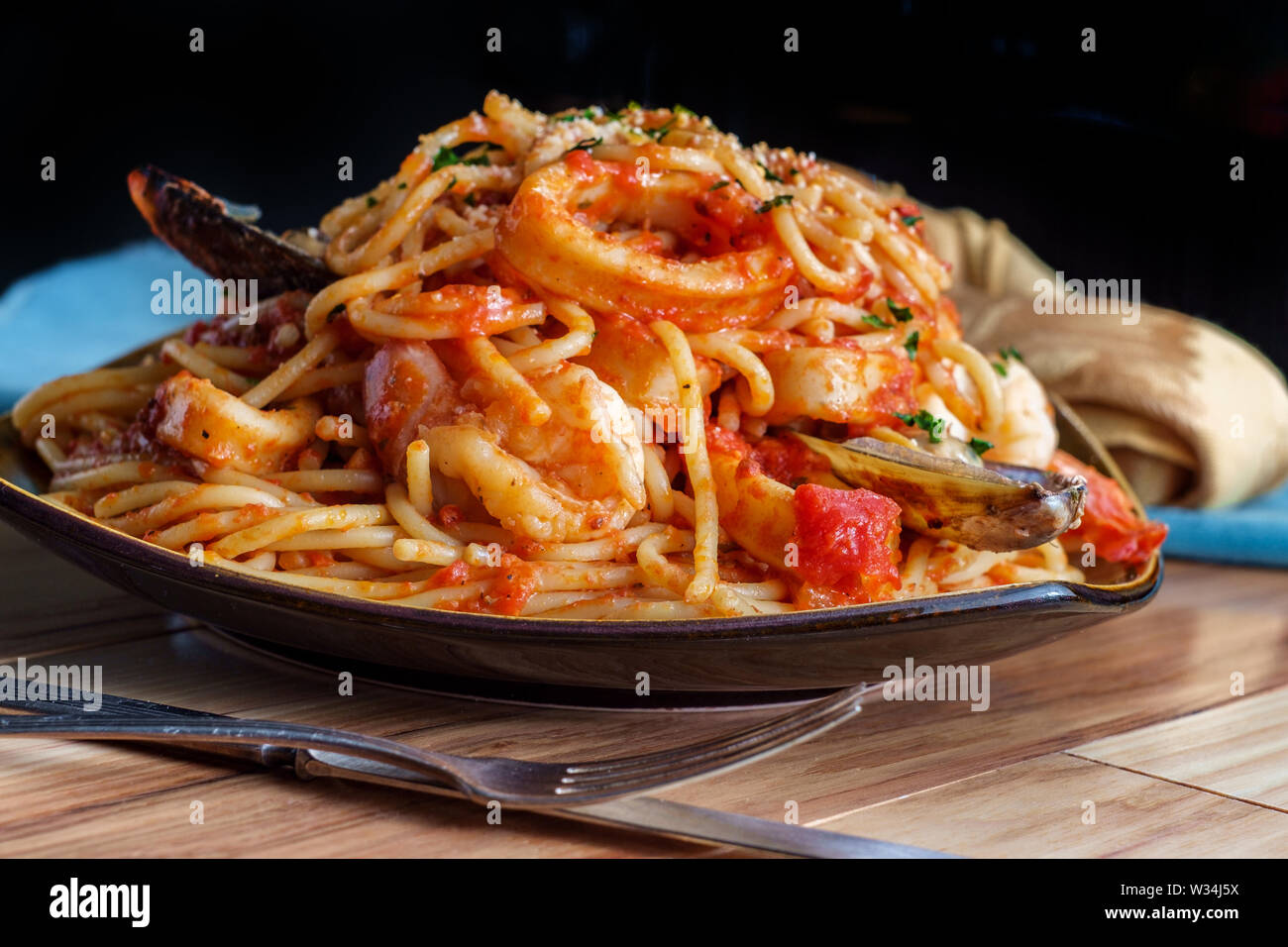 Italian seafood pasta pescatore with mussels shrimp and squid Stock ...