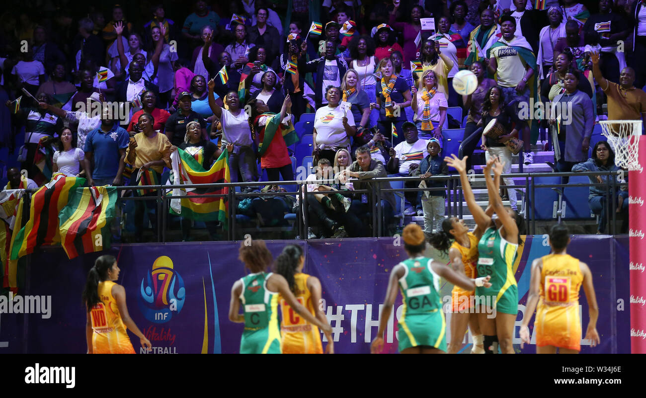 Supporters watch the action between Zimbabwe and Sri Lanka during the ...
