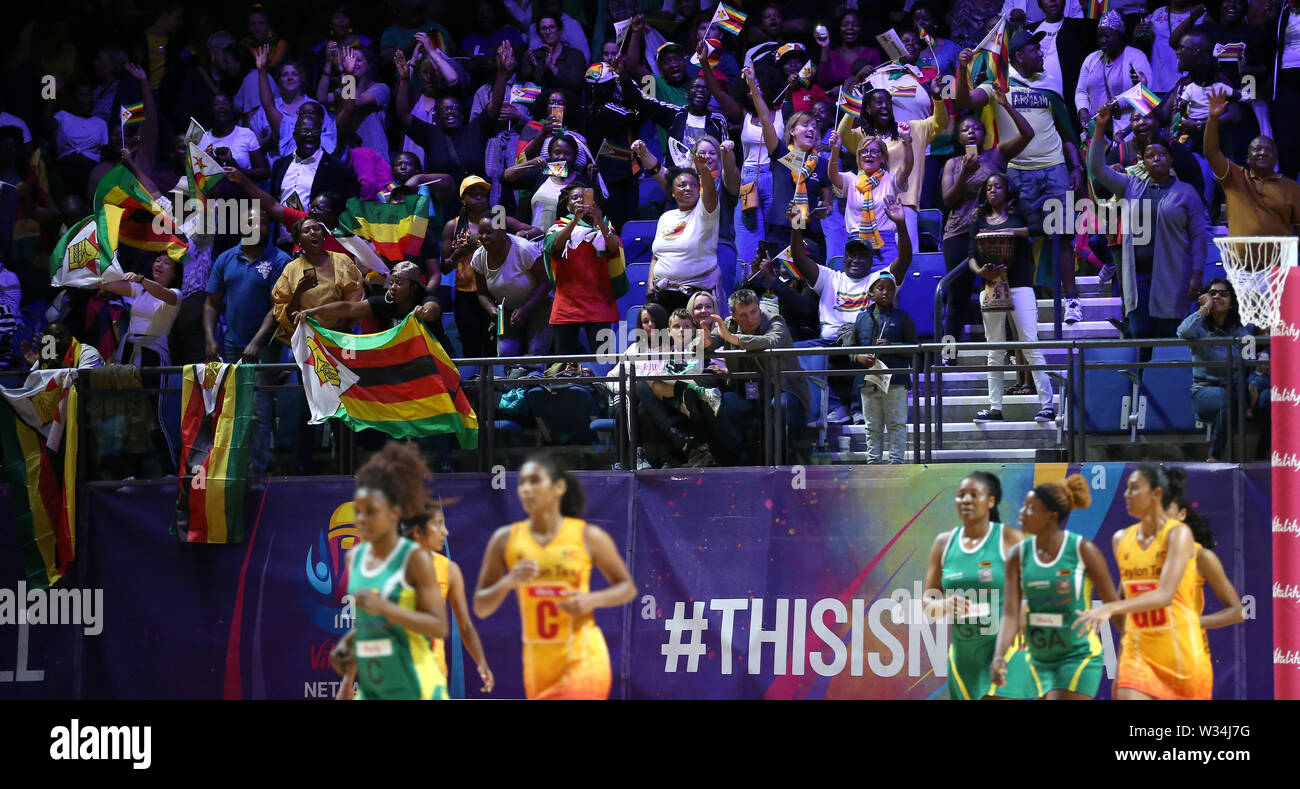 Zimbabwe's fans celebrate during the Netball World Cup match at the M&S ...