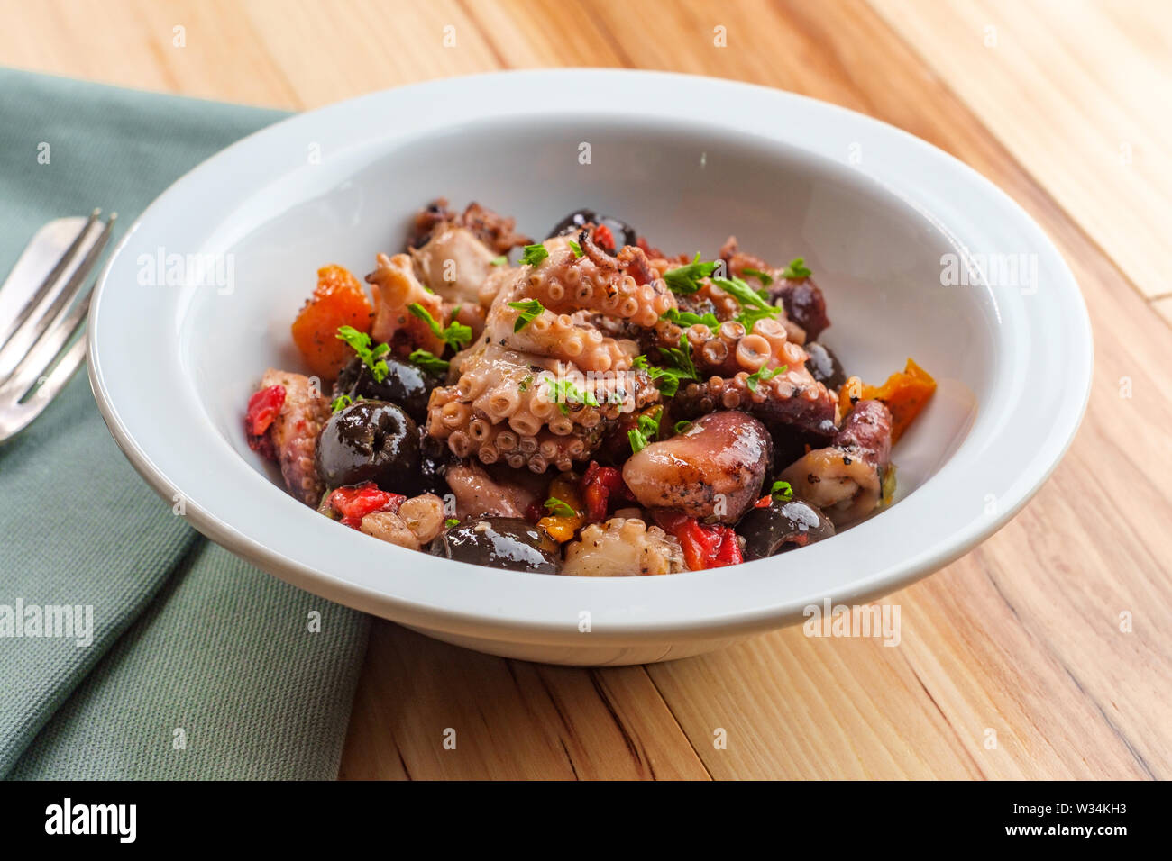 Spanish Octopus a La Vinagreta with oil and vinegar marinated kalamata ...