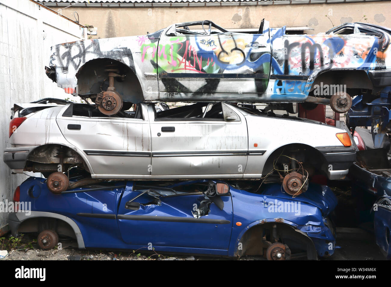 scrapped cars on a junkyard Stock Photo - Alamy