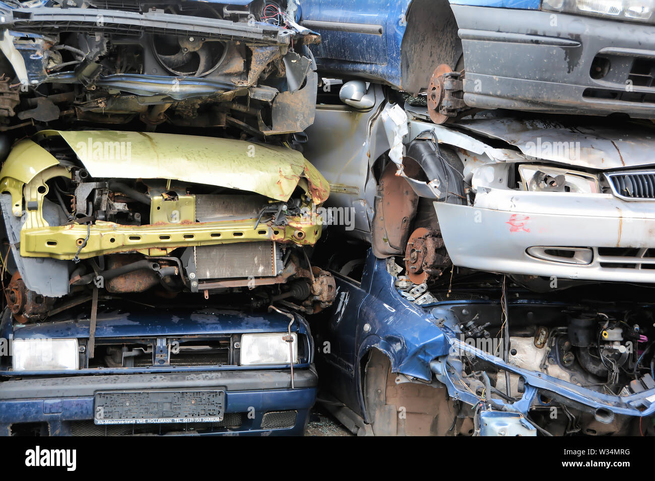 scrapped cars on a junkyard Stock Photo - Alamy