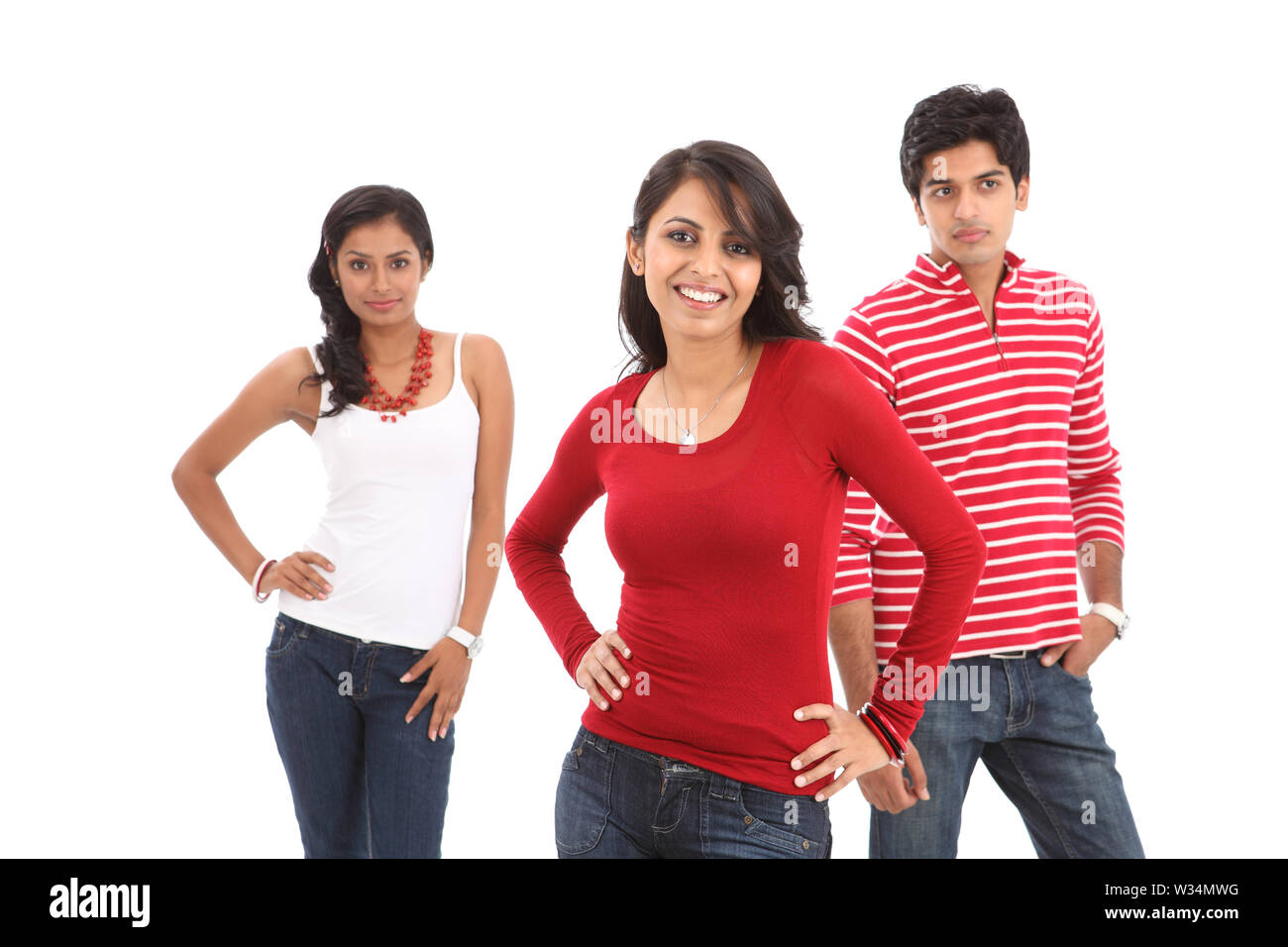 Three friends posing Stock Photo - Alamy