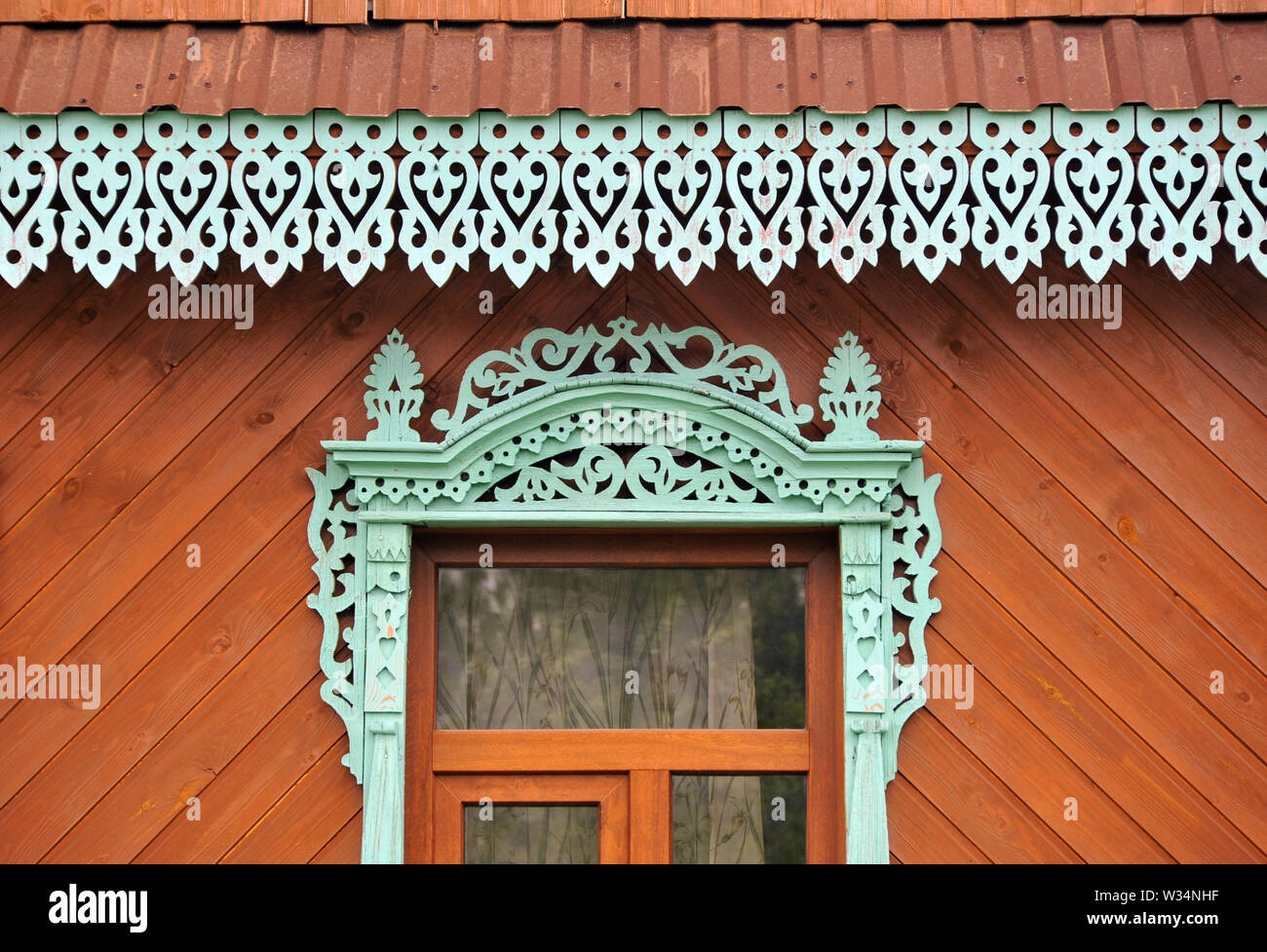 traditional design of windows and facade of russian house Stock Photo ...