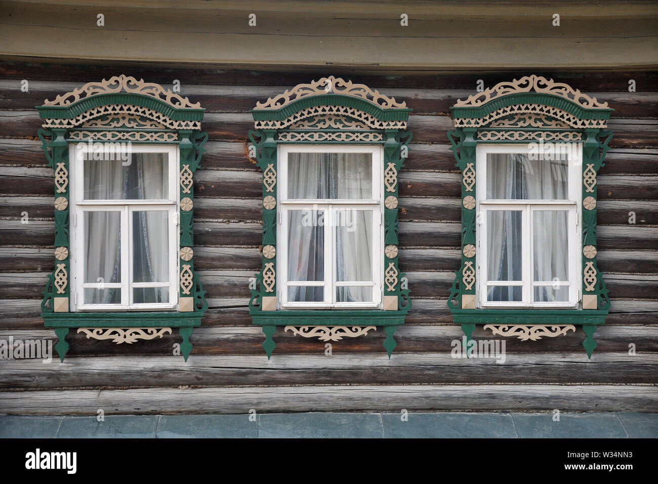 traditional design of windows and facade of russian house Stock Photo ...