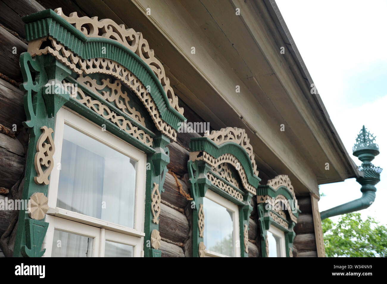 traditional design of windows and facade of russian house Stock Photo ...