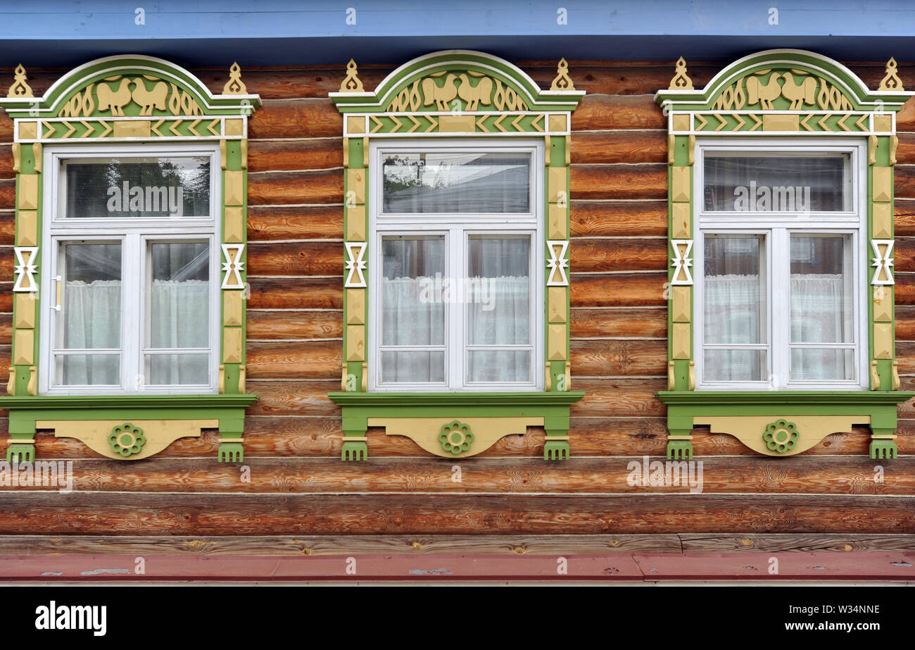 traditional design of windows and facade of russian house Stock Photo ...