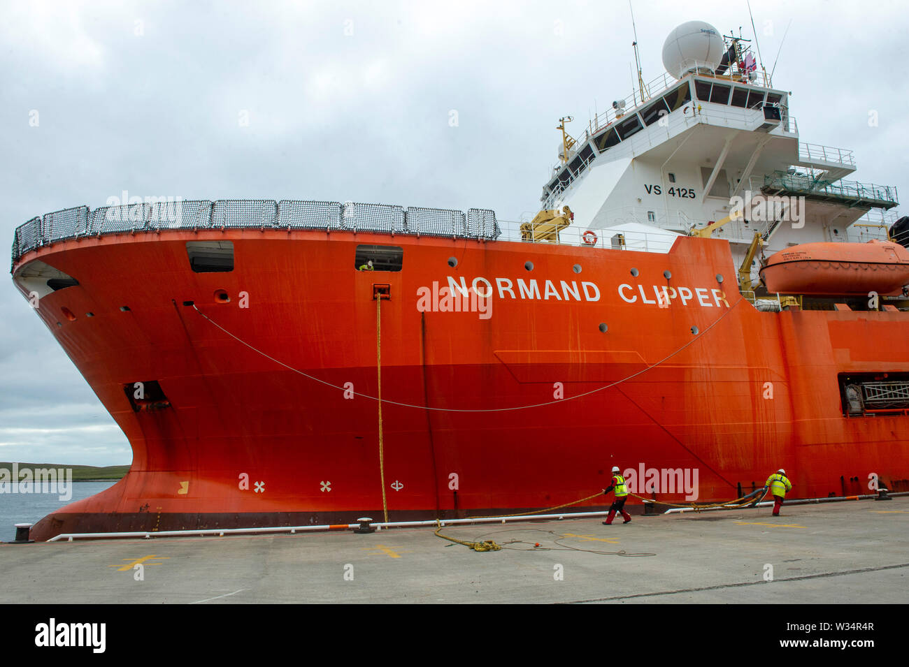 Normand Clipper berthing and putting ashore decommissioned oil rig ...