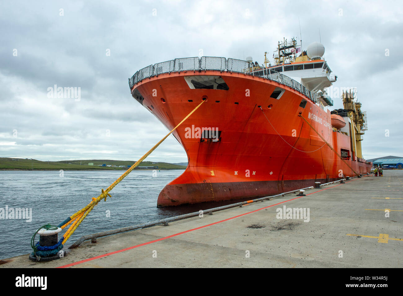 Normand Clipper berthing and putting ashore decommissioned oil rig ...