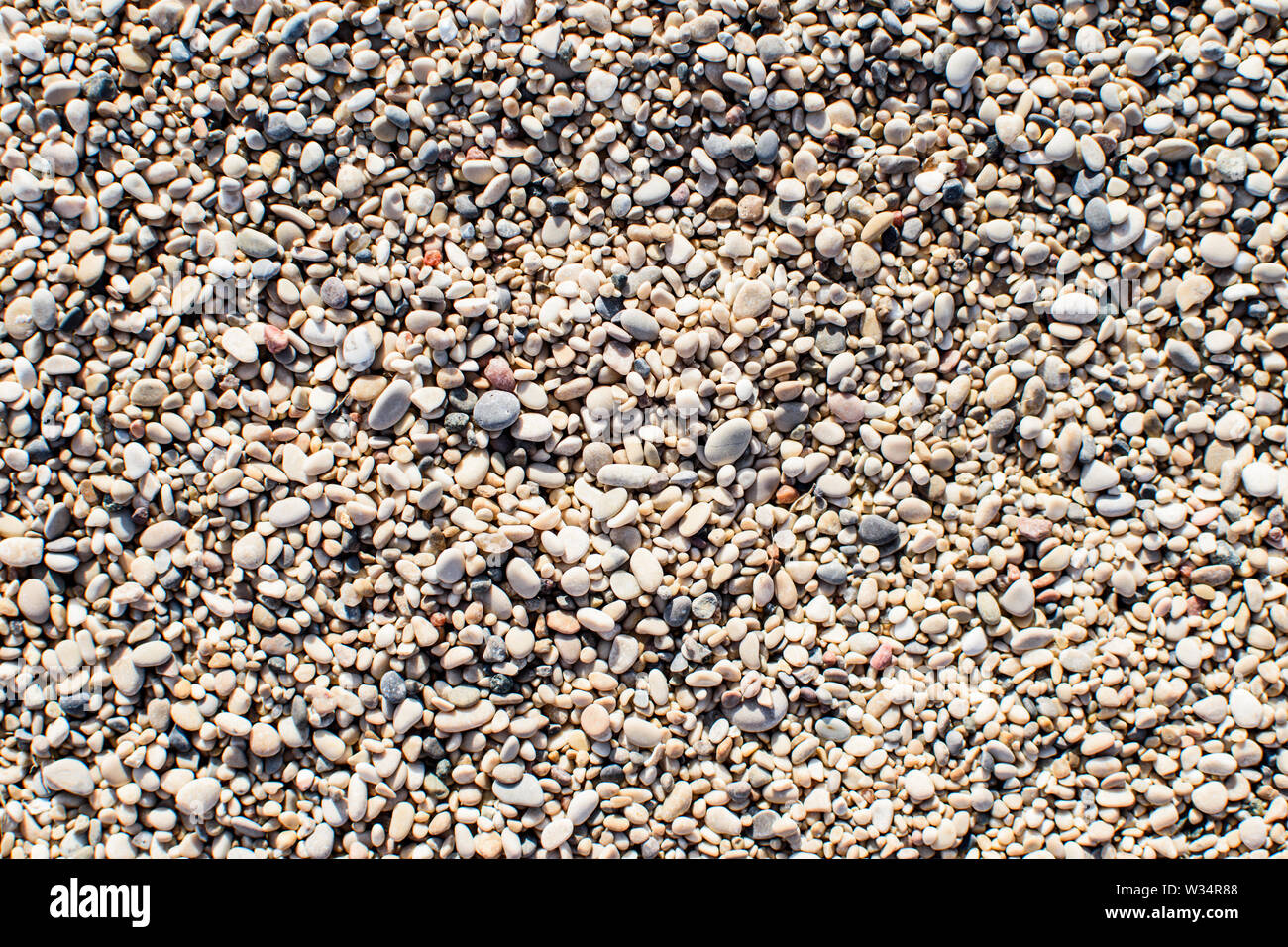 Surface of many small sea stones. Great for design and texture ...