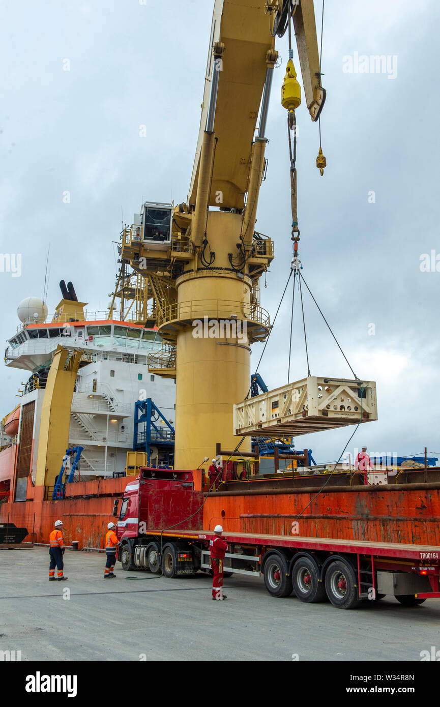 Normand Clipper berthing and putting ashore decommissioned oil rig ...