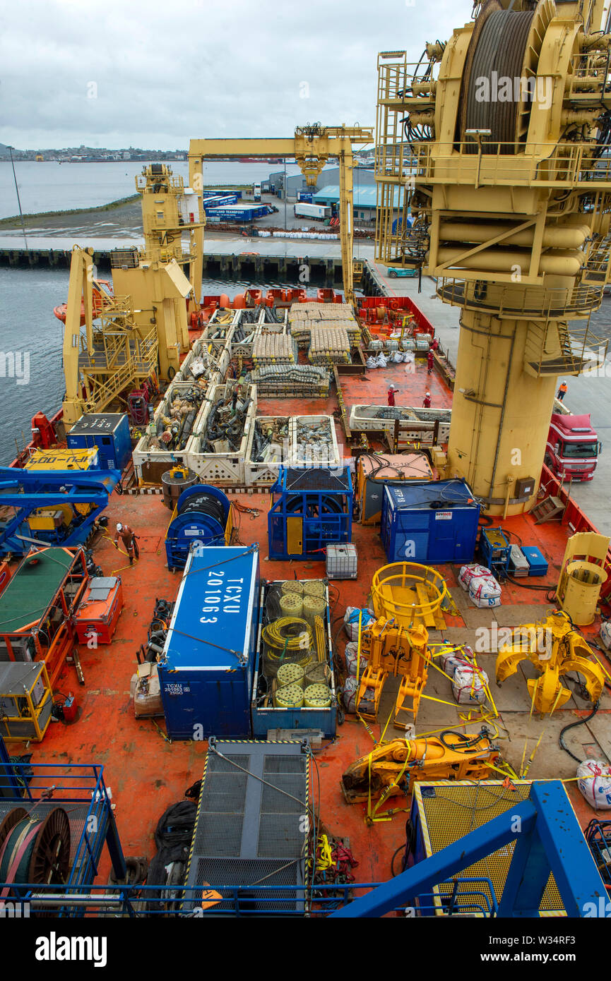 Normand Clipper berthing and putting ashore decommissioned oil rig ...