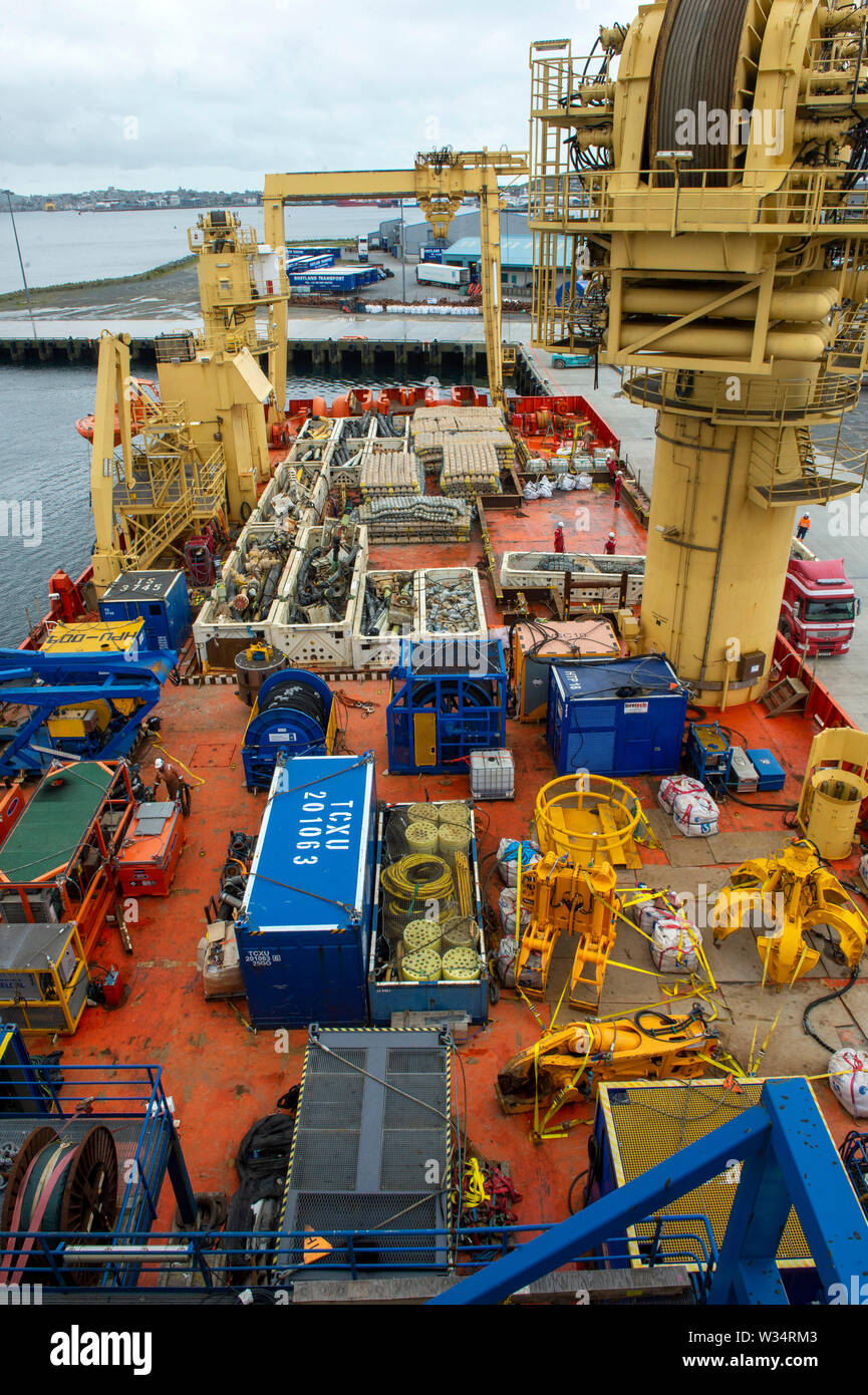 Normand Clipper berthing and putting ashore decommissioned oil rig ...